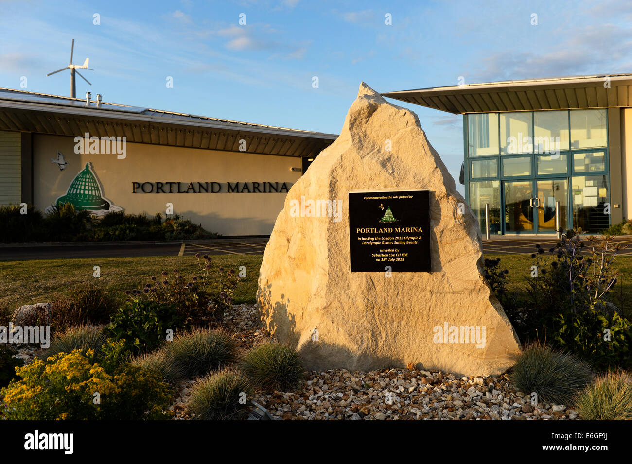 Main entrance to Portland Marina, UK, with a lynx helicopter on display ...