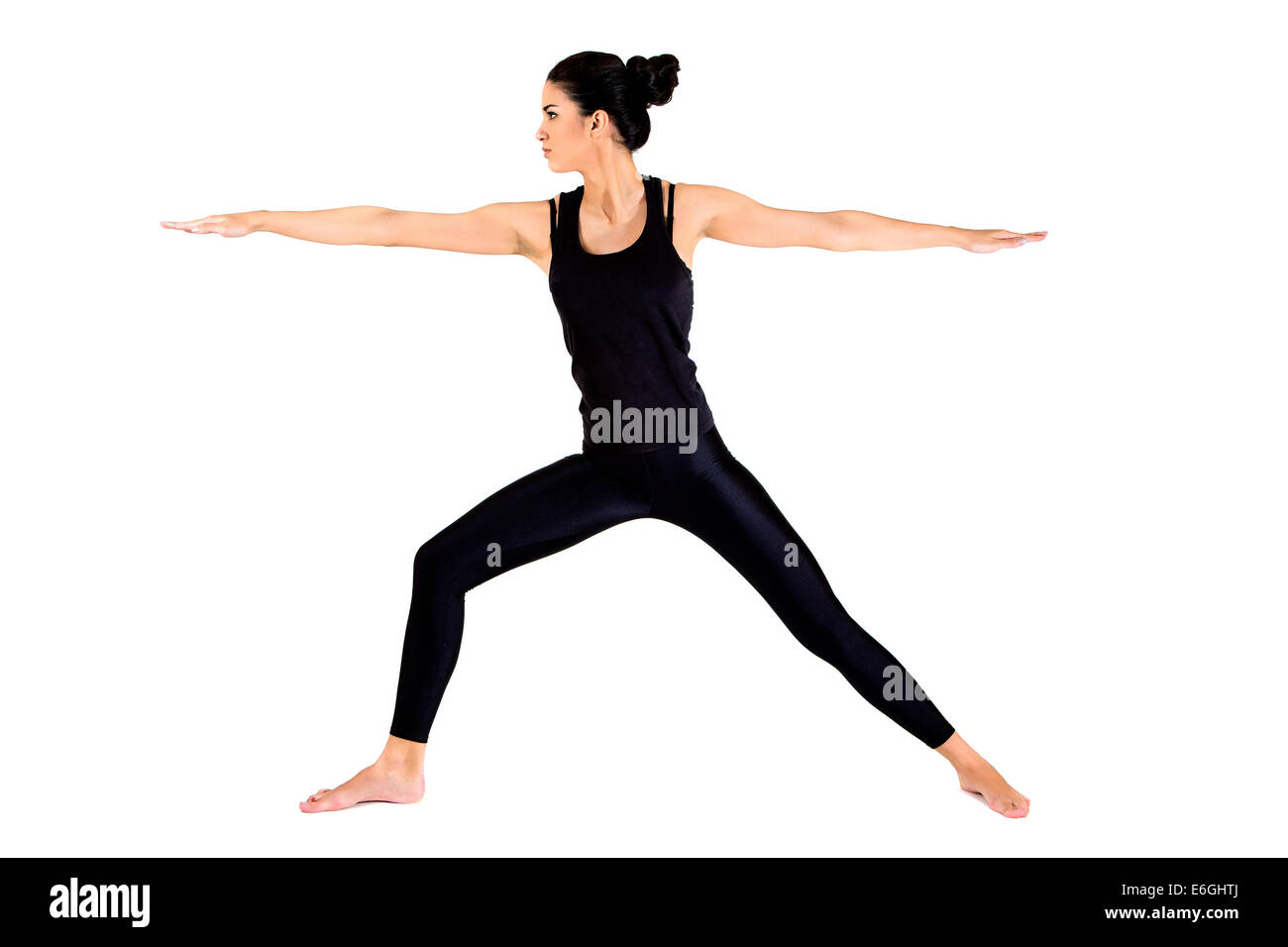 Pretty young woman training yoga Stock Photo - Alamy