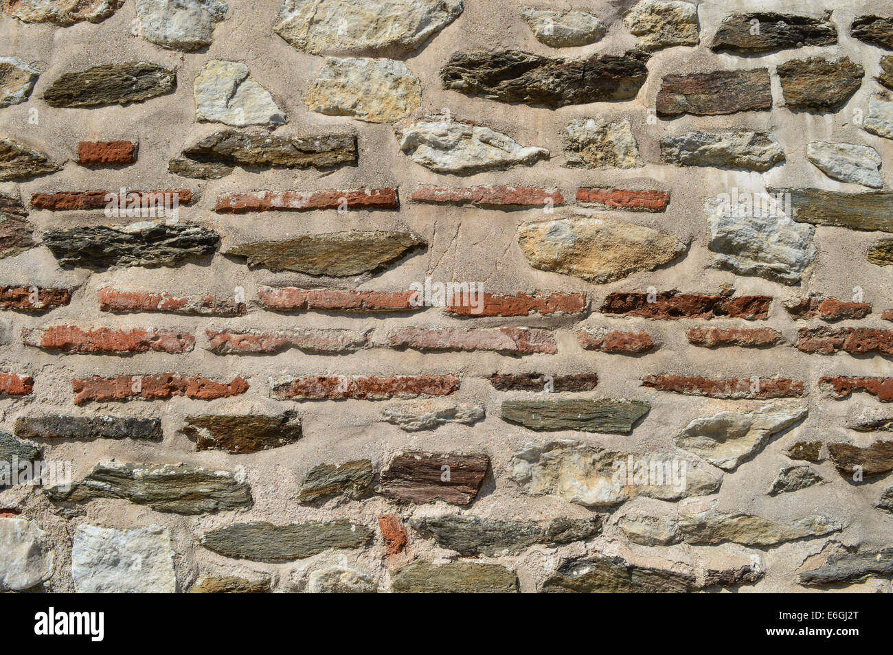 An ancient stone and brick wall Stock Photo - Alamy