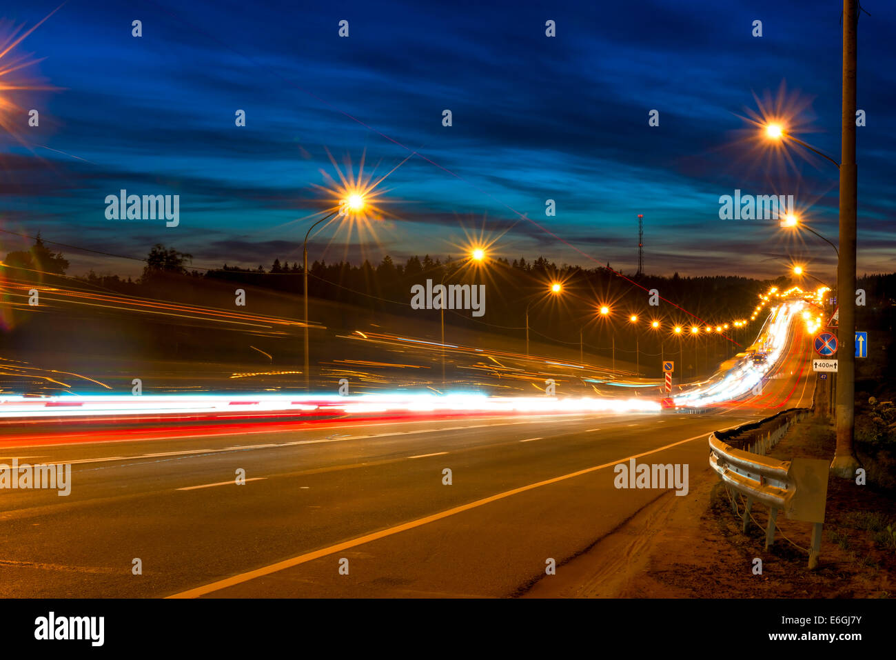 movement of vehicles on the highway at night Stock Photo - Alamy
