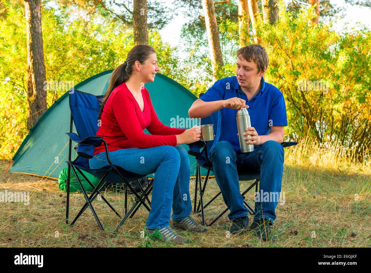 Young male female tourists sitting hi-res stock photography and images ...
