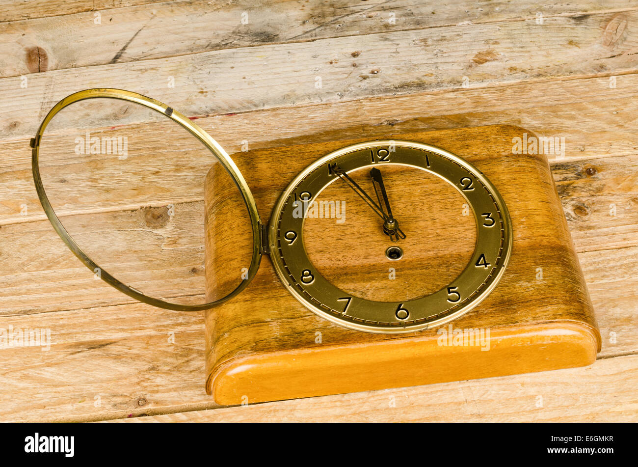 An old wooden wall clock with its lid open Stock Photo - Alamy