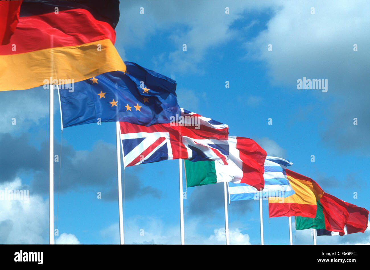 European flags waving under cloudy skies showcasing unity and diversity ...