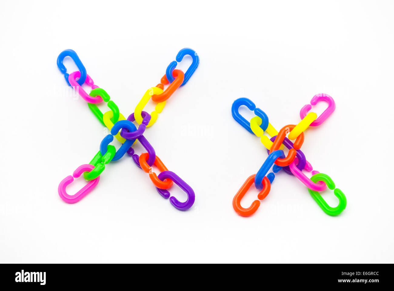 X and x Alphabet, Created by Colorful Plastic Chain Stock Photo - Alamy