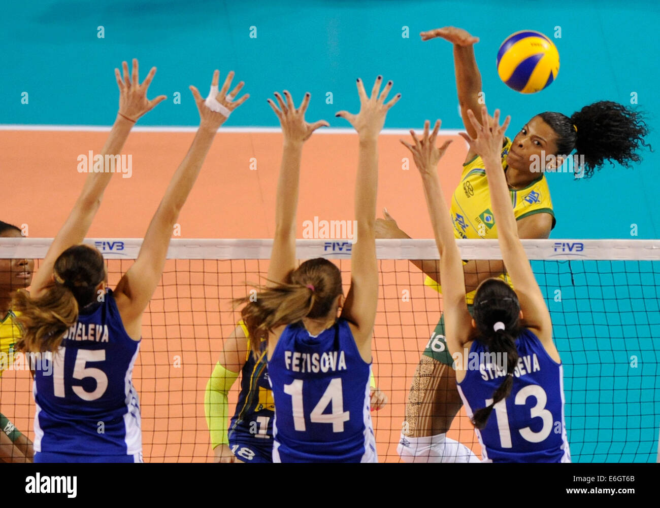 Tokyo, Japan. 23rd Aug, 2014. Fernanda Rodrigues (R) of Brazil spikes ...