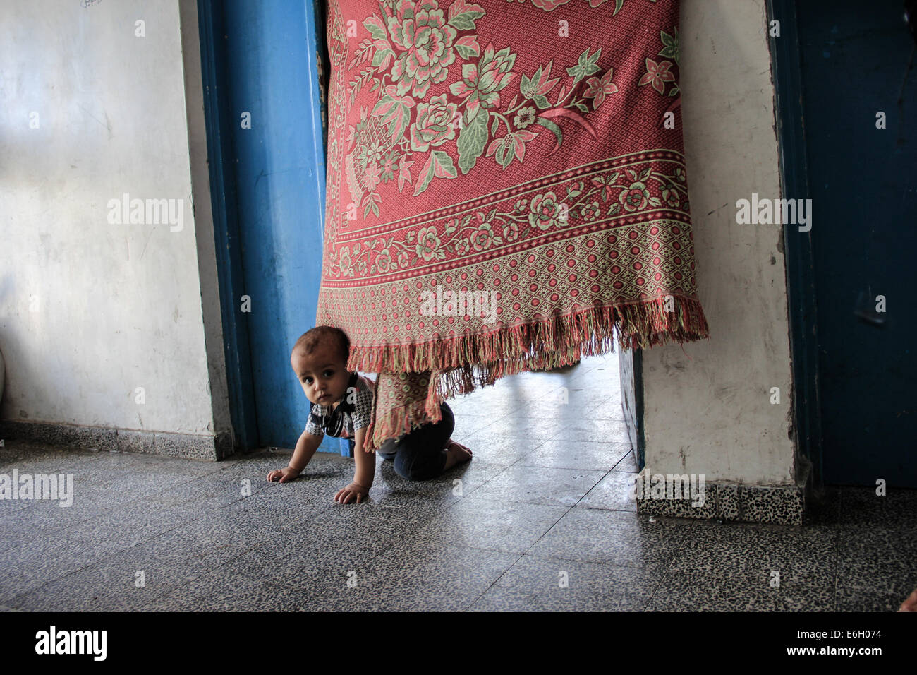 The displaced Palestinian children happily play in the camp where they ...