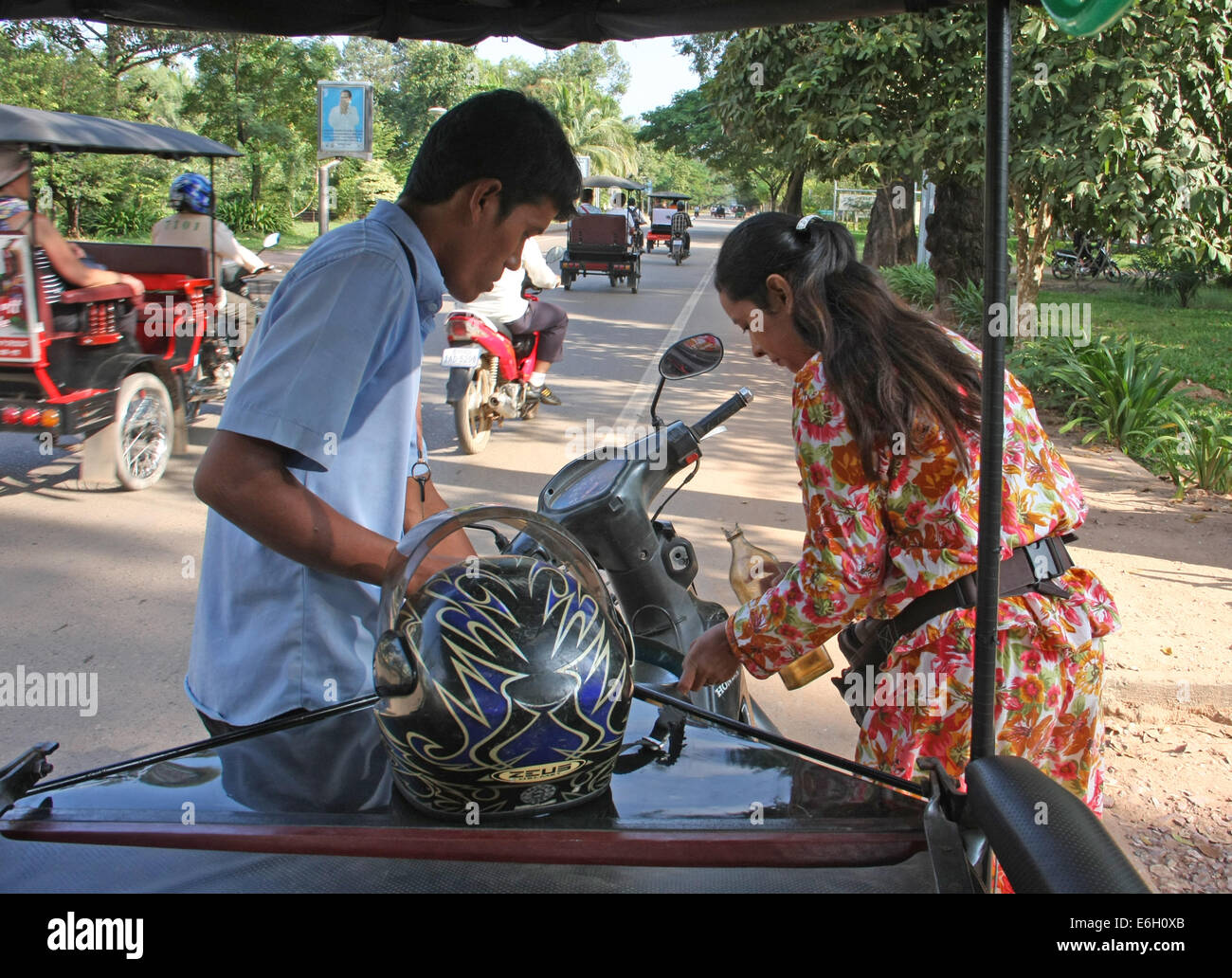 Moto driver in Cambodia Stock Photo - Alamy