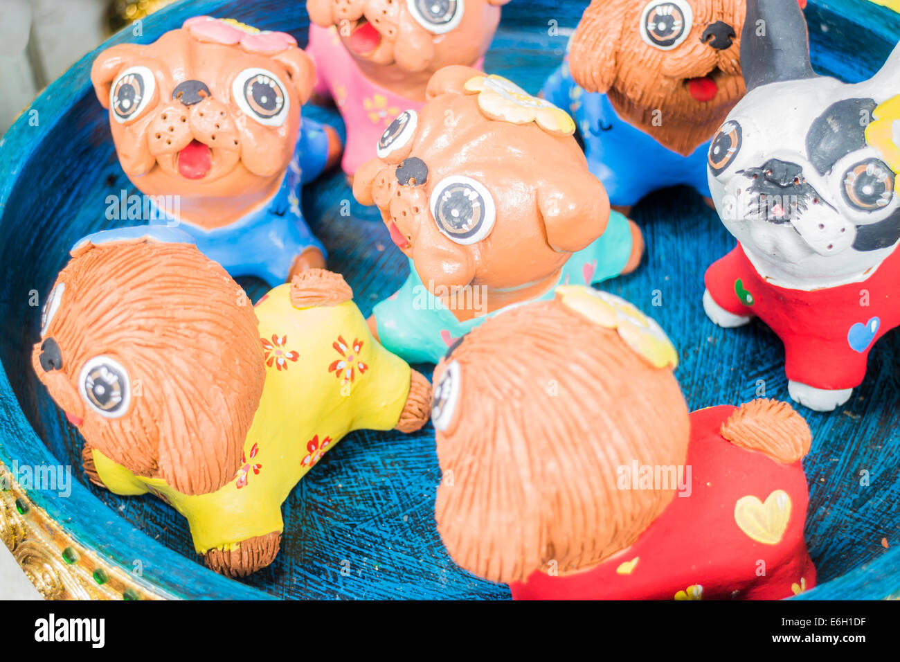 Funny dog doll made from baked clay, stock photo Stock Photo - Alamy
