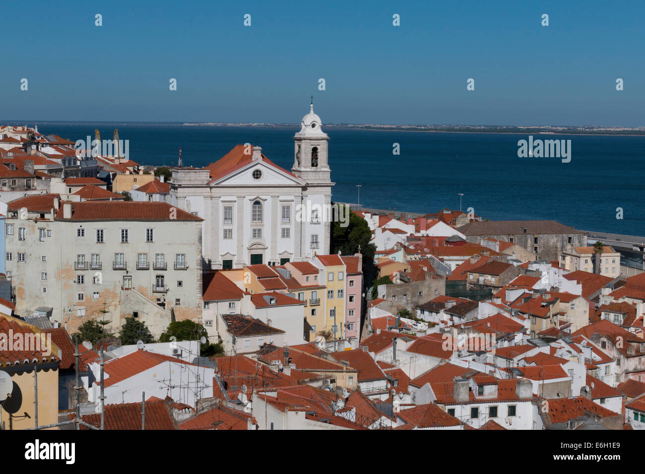 Panorama of old traditional city of Lisbon with red roofs and view of ...