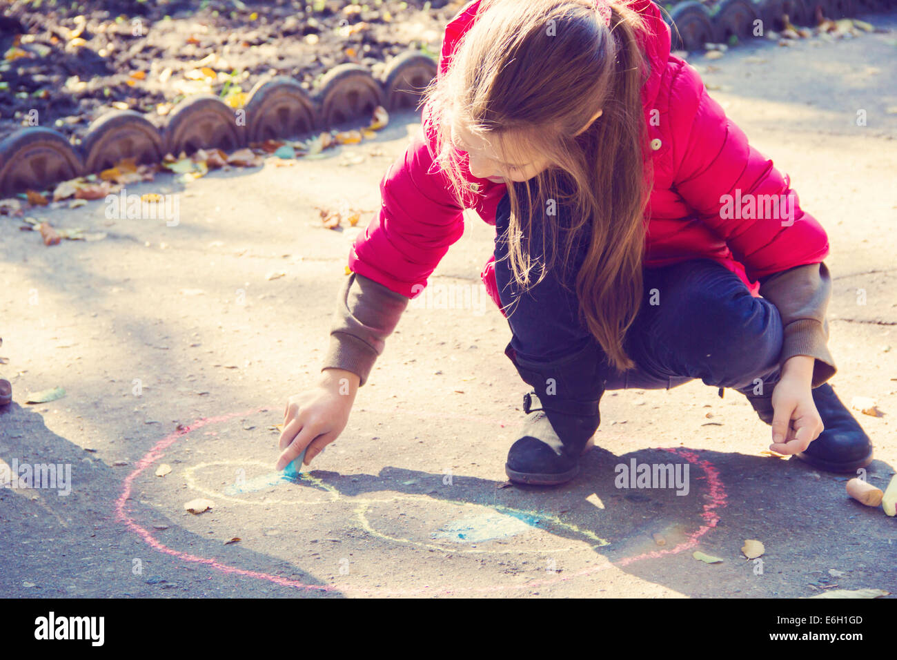girl draw with chalk Stock Photo - Alamy