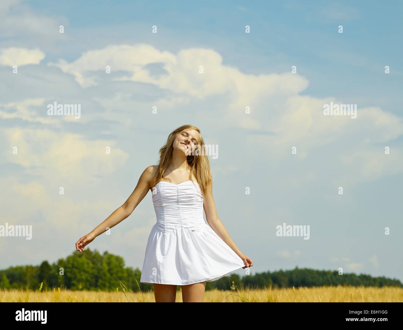 Natural beautiful young woman, rural landscape on background Stock ...
