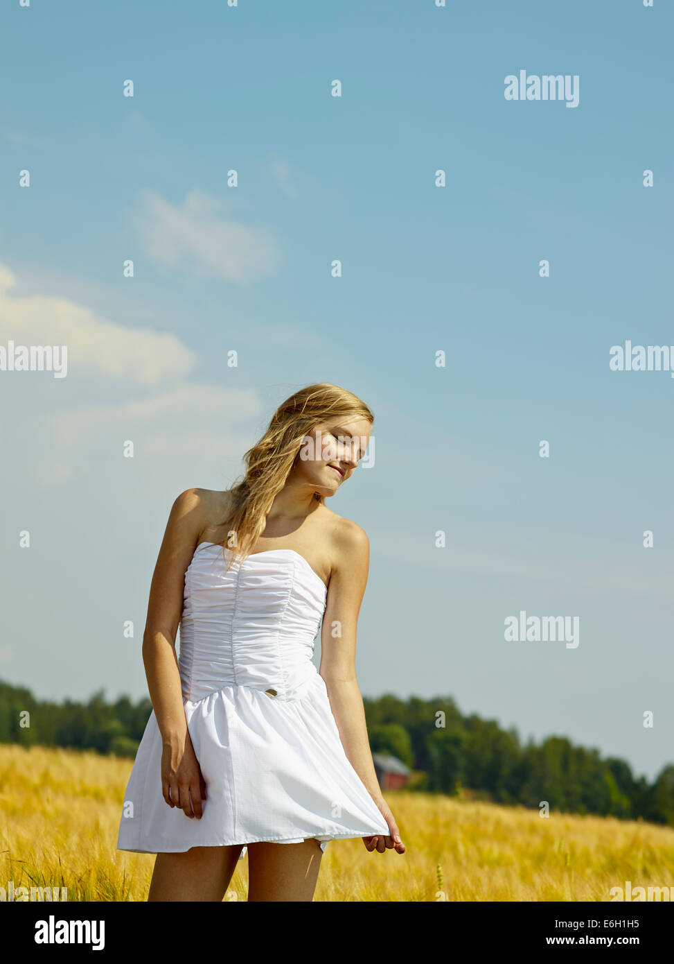 Natural beautiful young woman, rural landscape on background Stock ...