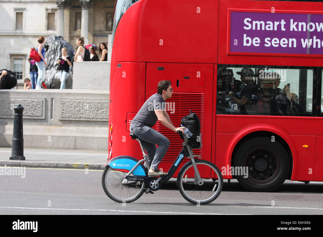 Cyclists riding alongside road hi-res stock photography and images - Alamy