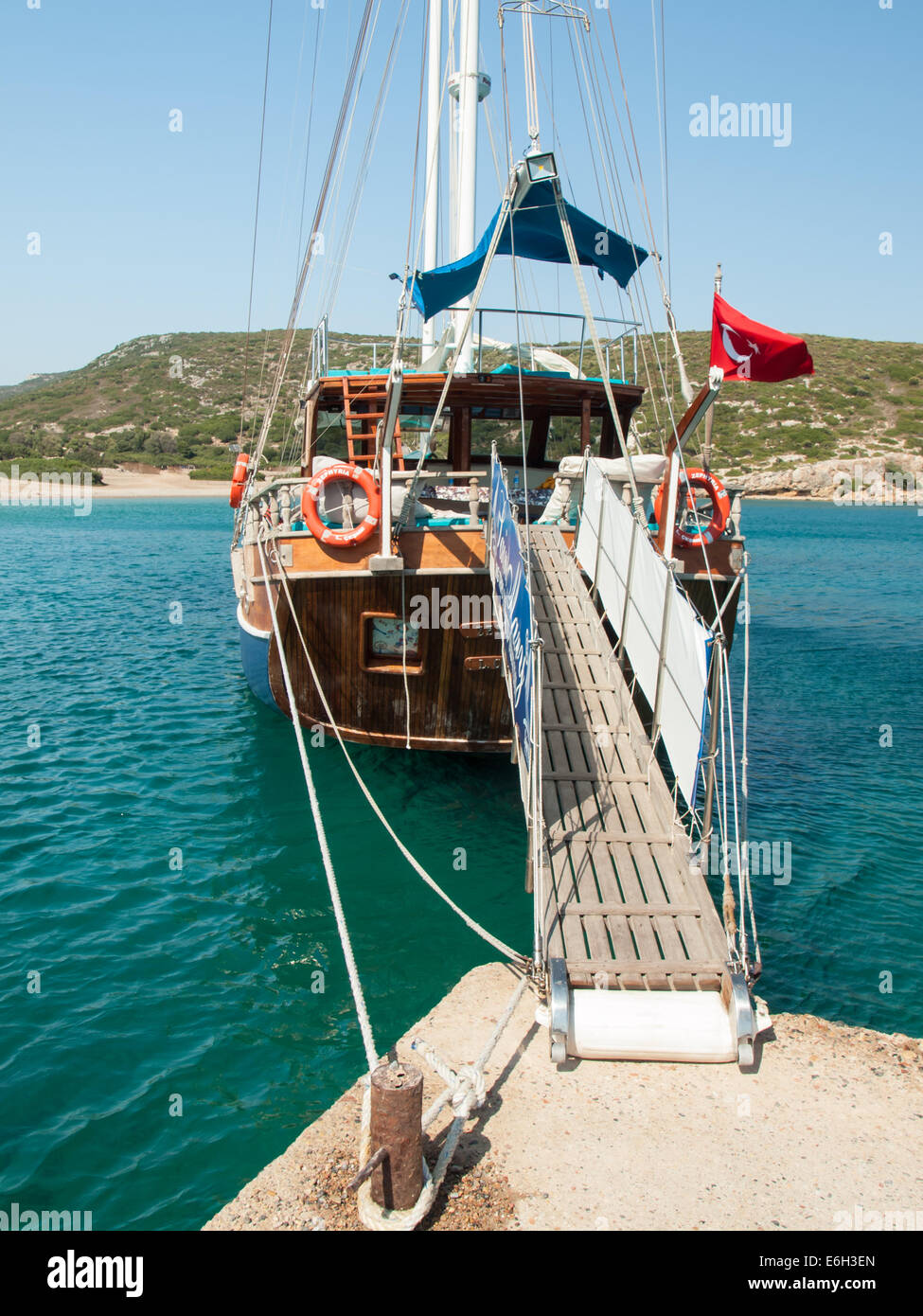 charter boat moored on donkey island in the turkish aegean Stock Photo ...