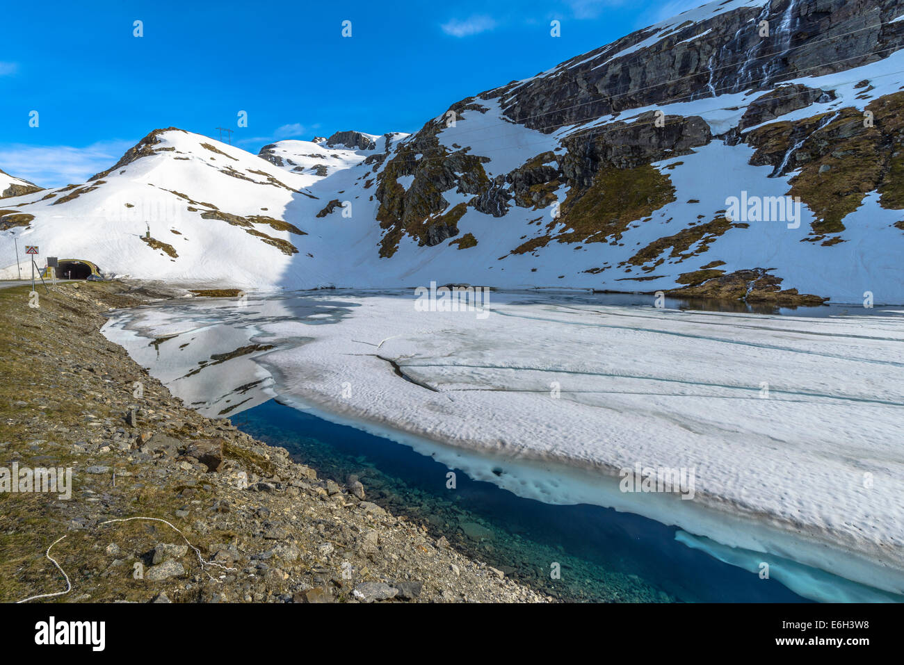 Partially frozen lake in Norway in Spring Stock Photo - Alamy