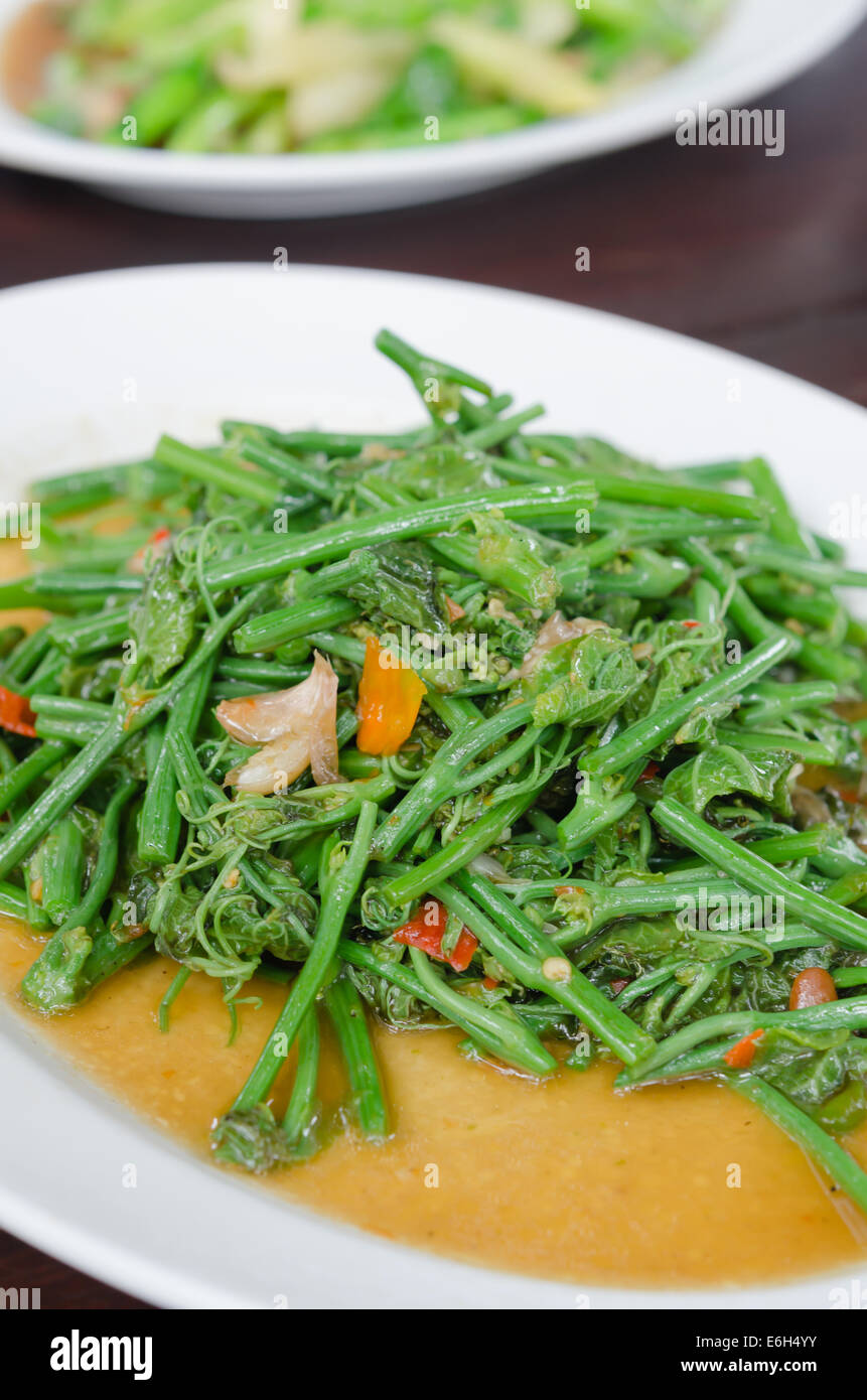 Stir fried chayote with chili on white dish Stock Photo - Alamy