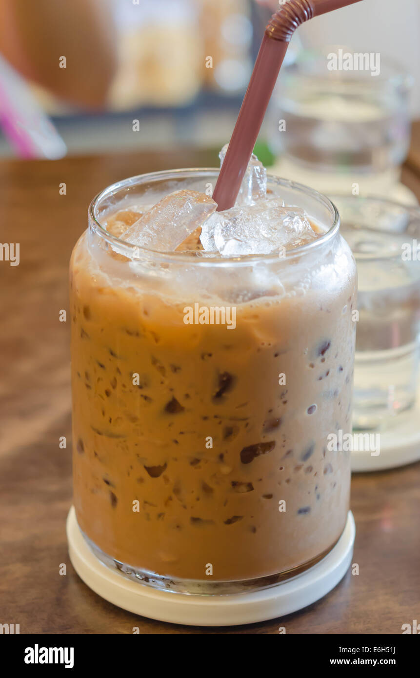 Iced coffee with milk is on the table Stock Photo - Alamy