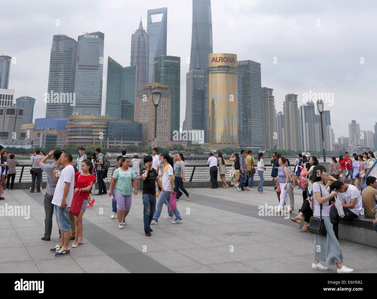 Crowds on The Bund looking across to Pudong, Shanghai China Stock Photo ...