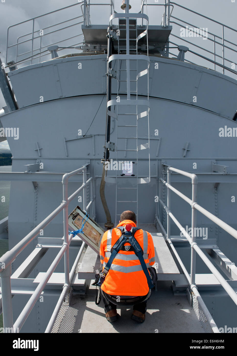 Engineer inspecting the steelwork at top of the Forth Road Bridge ...