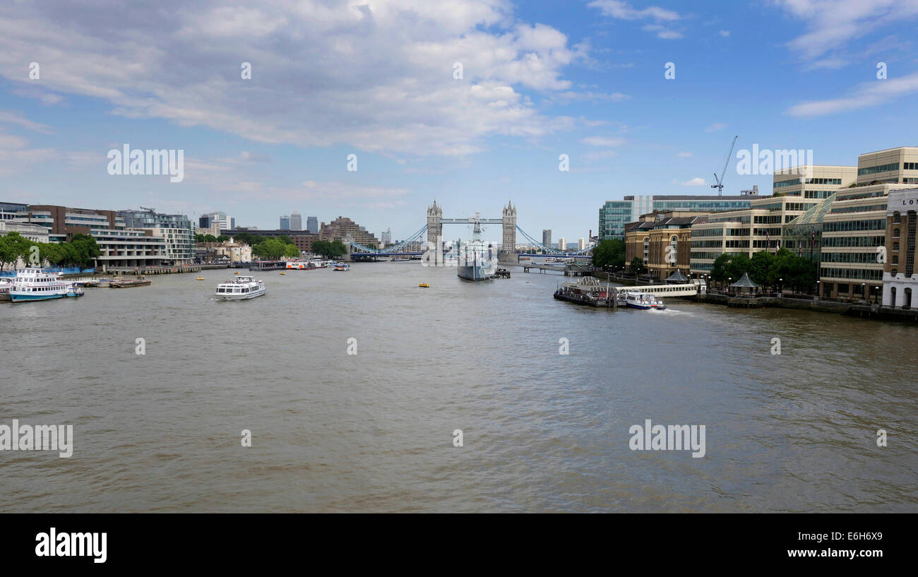The River Thames Pool of London with Tower Bridge and HMS Belfast Stock ...
