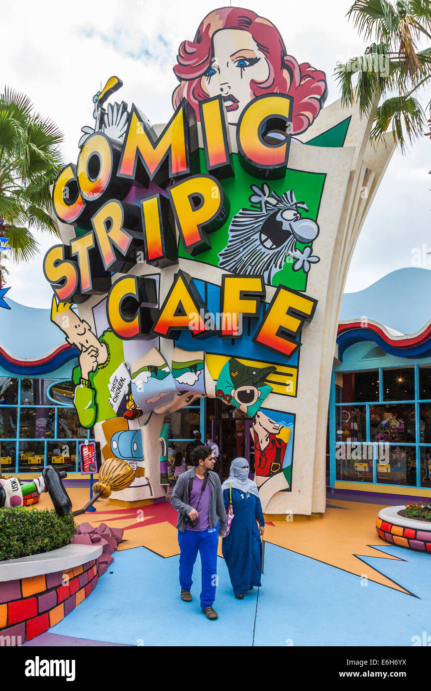 Muslim couple leaving Comic Strip Cafe in Toon Lagoon at Universal ...