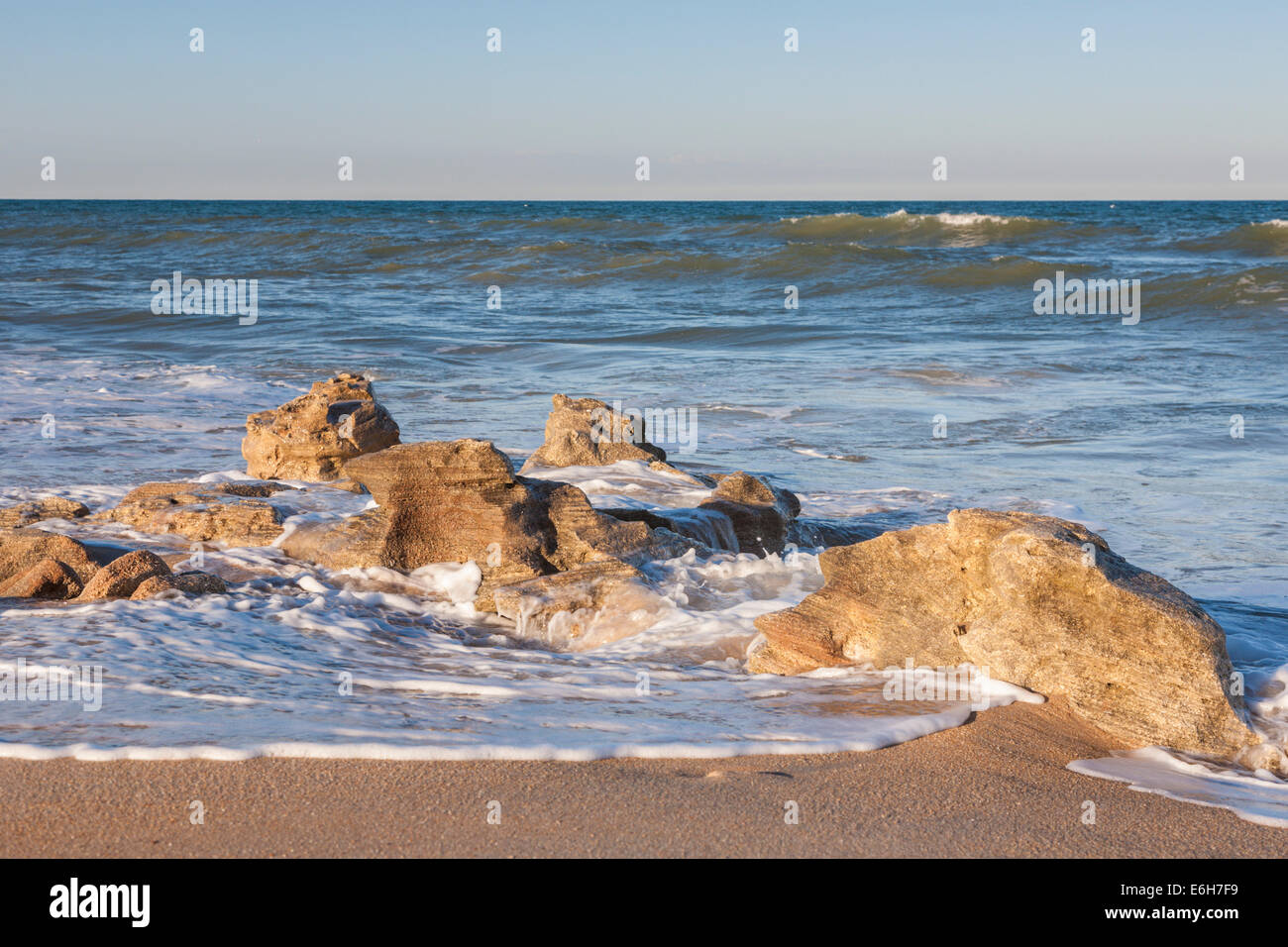 Coquina rock formations along coast of Atlantic Ocean at Washington ...