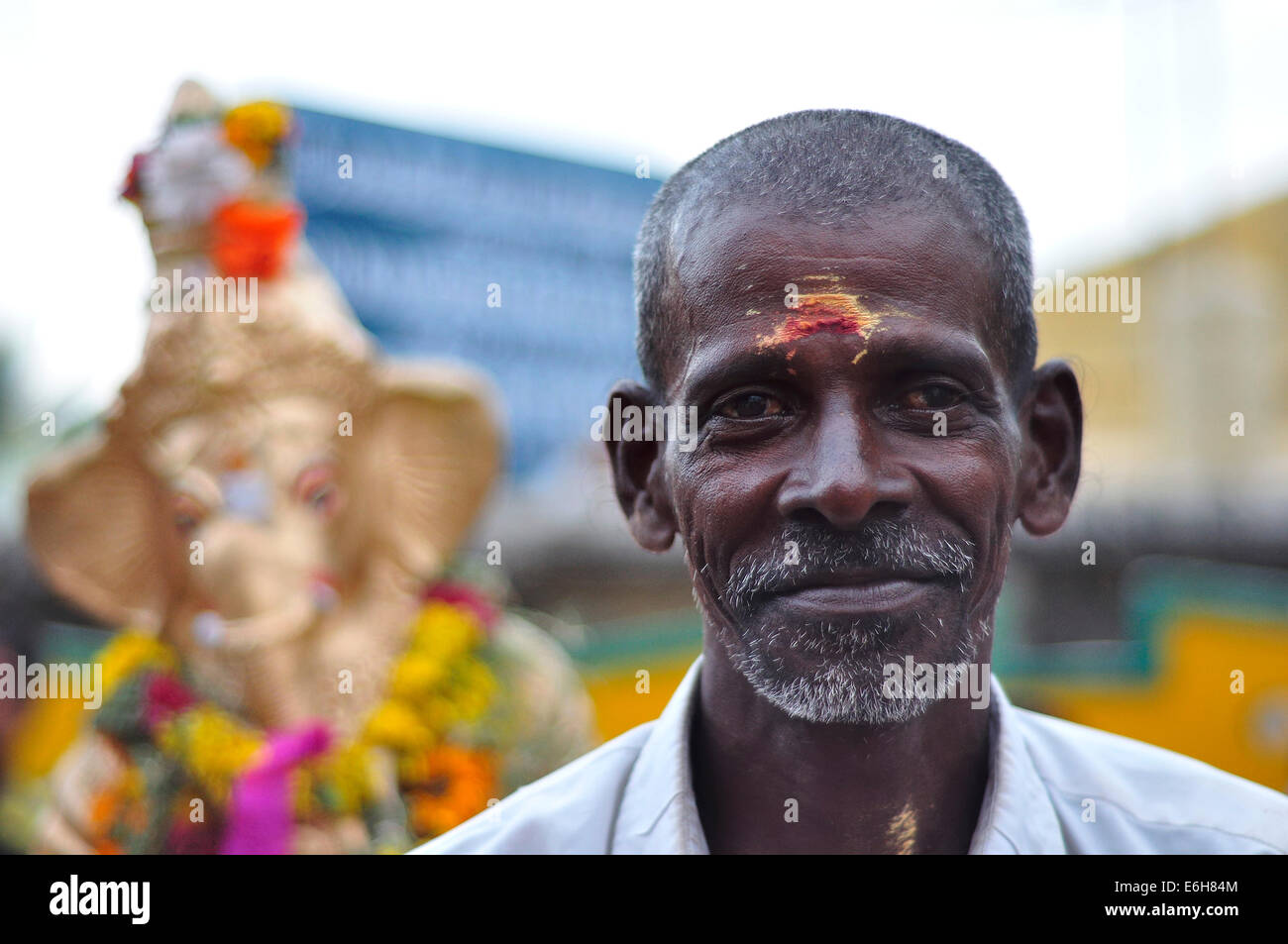 Indian man celebrates Ganesh Chaturthi leading the Ganesh sculptures ...