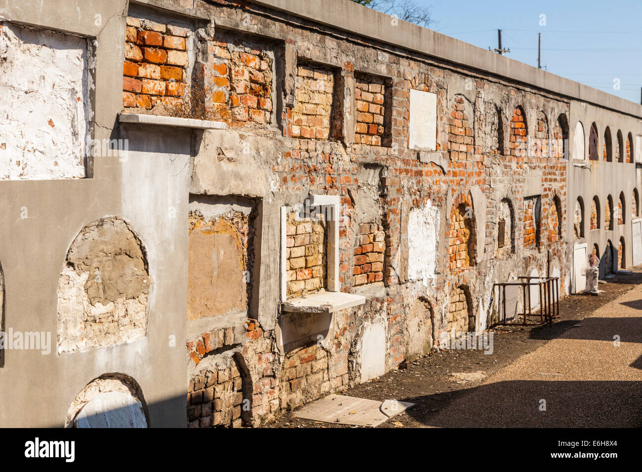 Above ground graves in mausoleum wall at St. Louis Cemetery No. 1 in ...