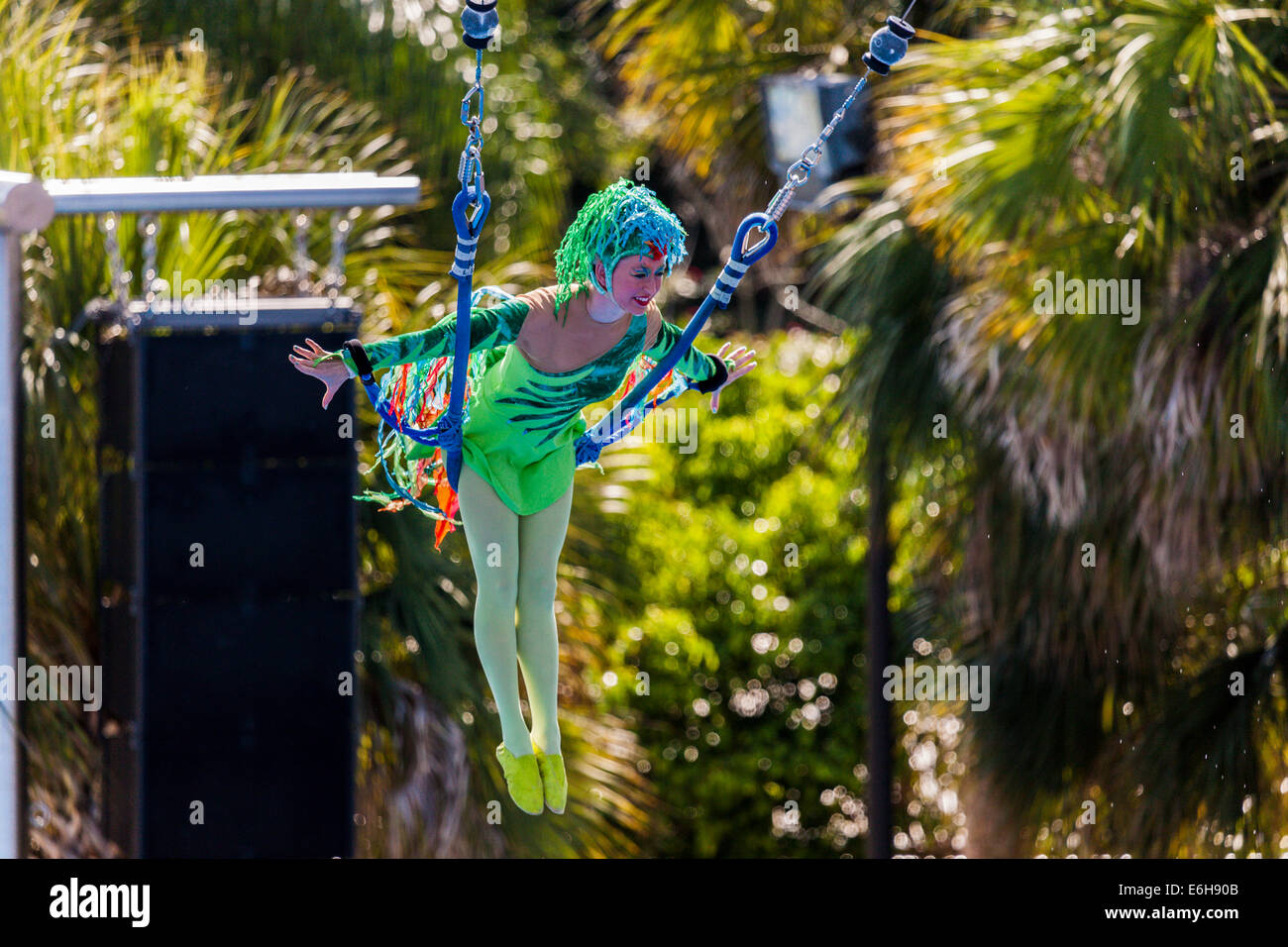 Acrobatic performer flying on swing during Blue Horizons show at Sea ...