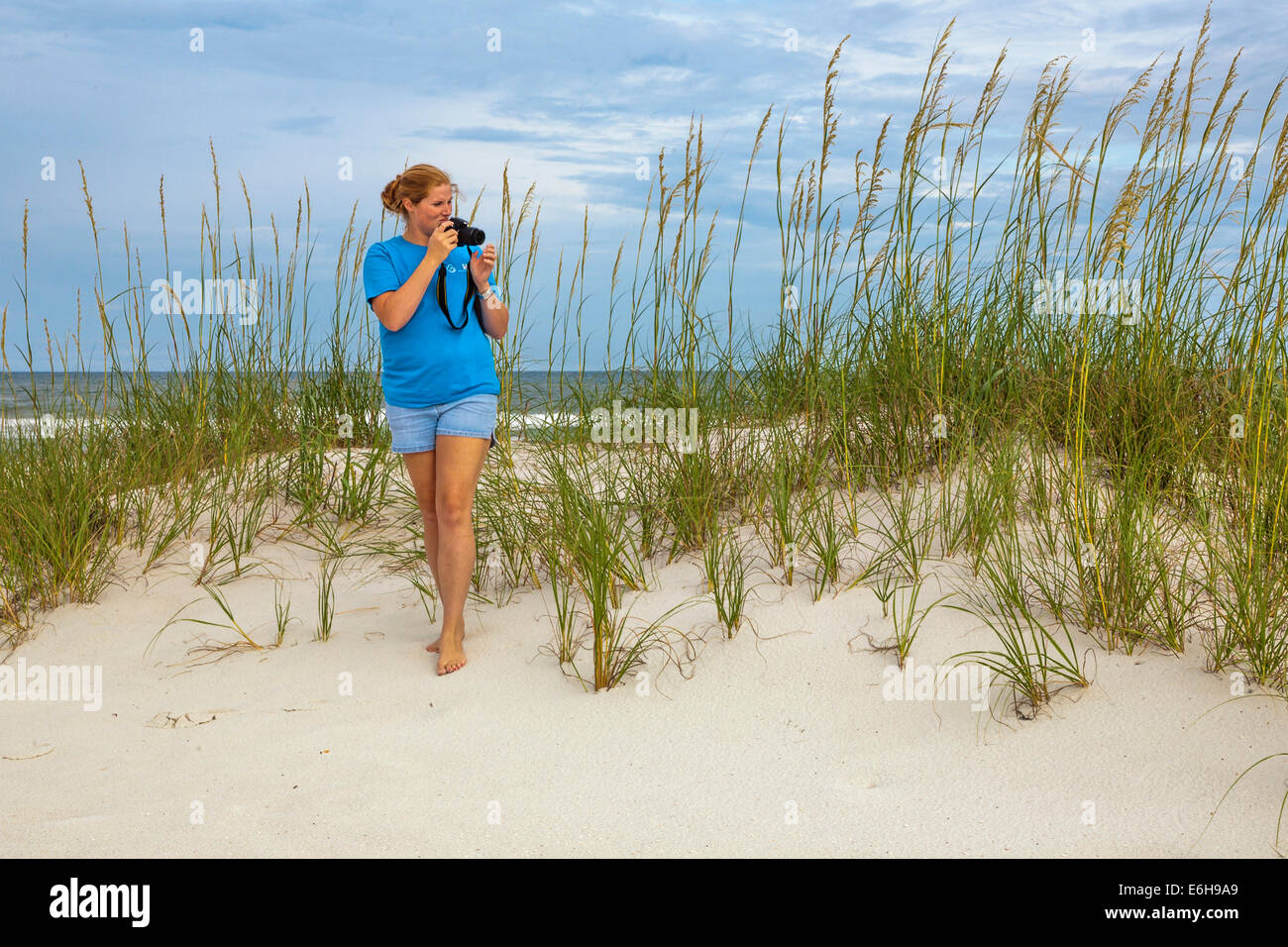 Woman exploring beach hi-res stock photography and images - Alamy