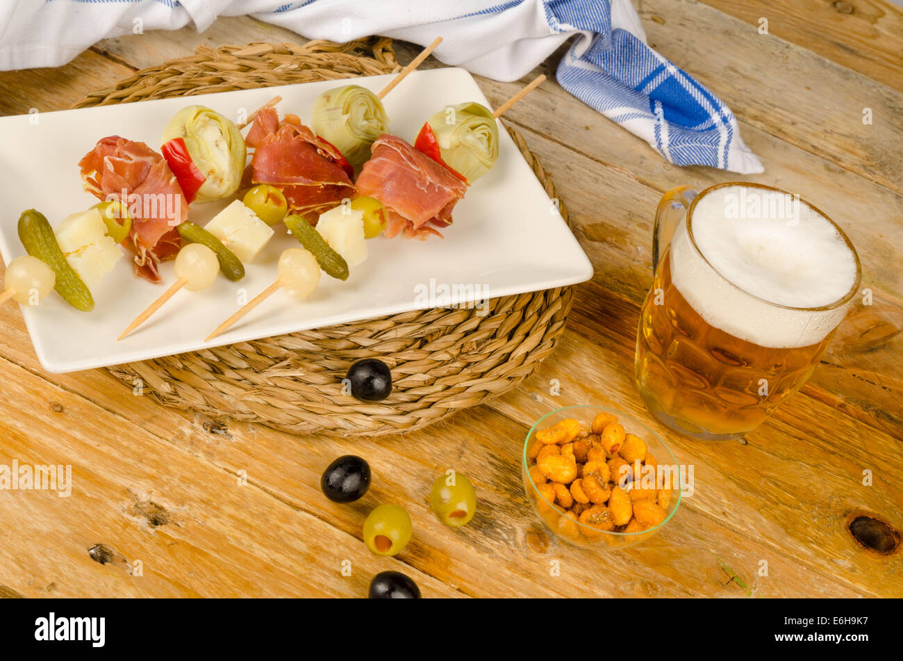 Serrano ham tapa on a skewer, Spanish appetizer Stock Photo - Alamy