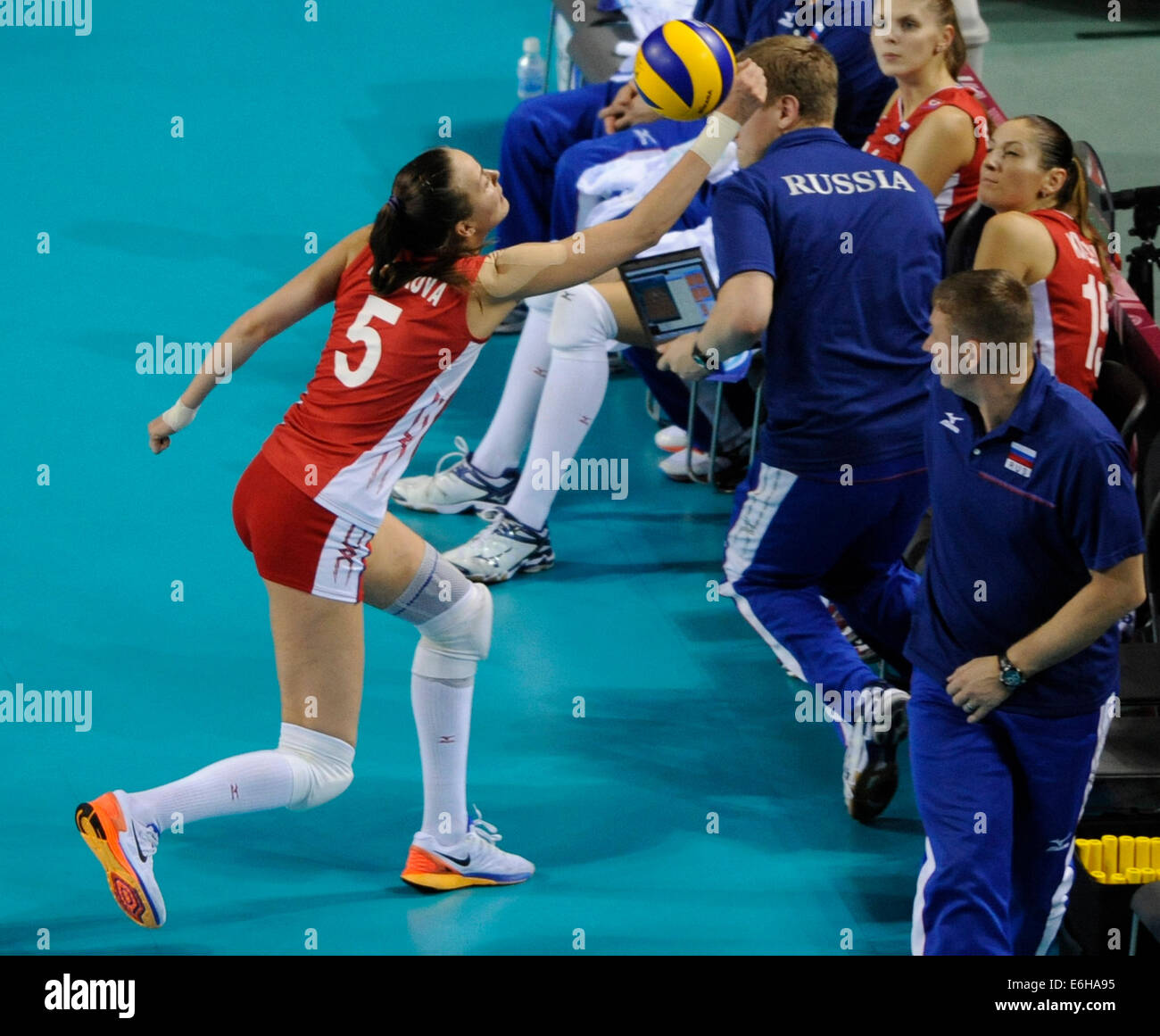 Tokyo, Japan. 24th Aug, 2014. Alexandra Pasynkova (L) of Russia saves ...