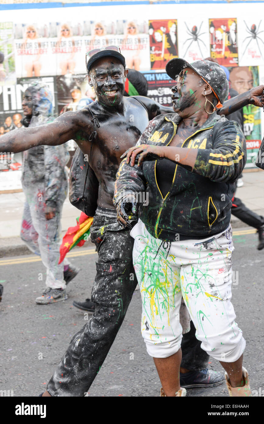 London, UK. 24th Aug, 2014. Hundreds of people join the ‘Jouvert ...