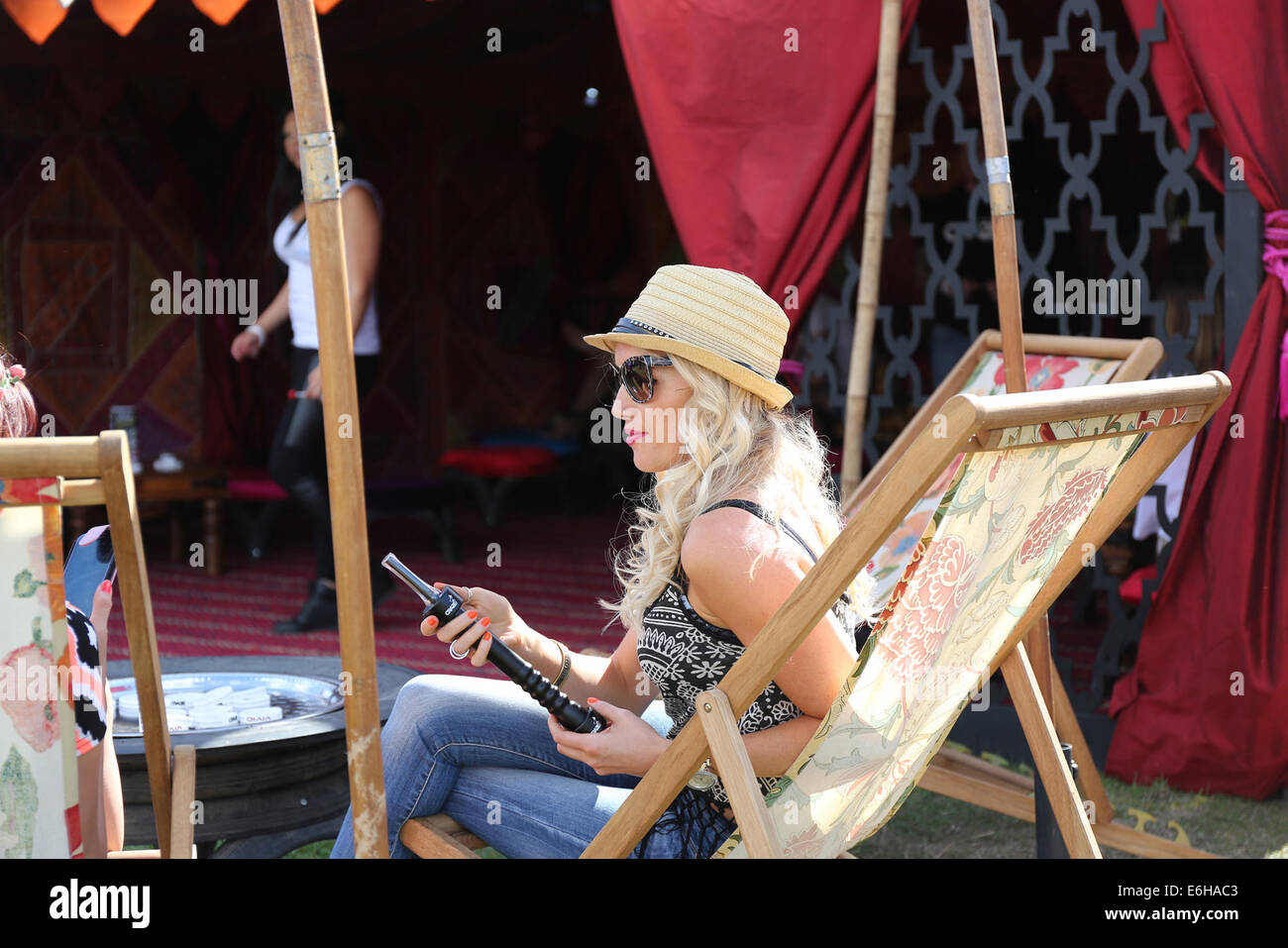 London, UK. 23rd Aug, 2014. Pictures showing festival goers with e ...