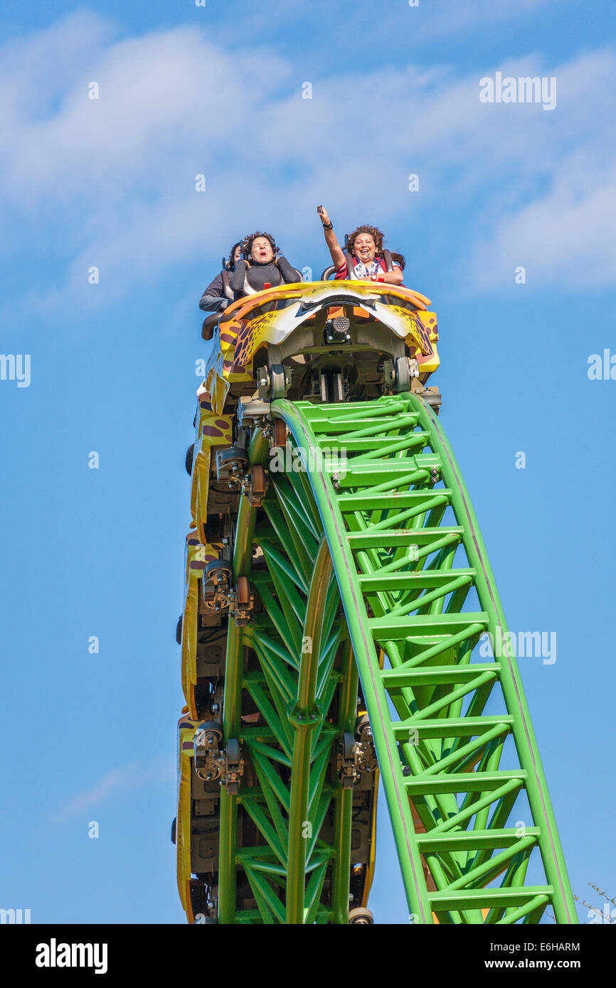 Park guests riding Cheetah Hunt roller coaster at Busch Gardens Tampa ...