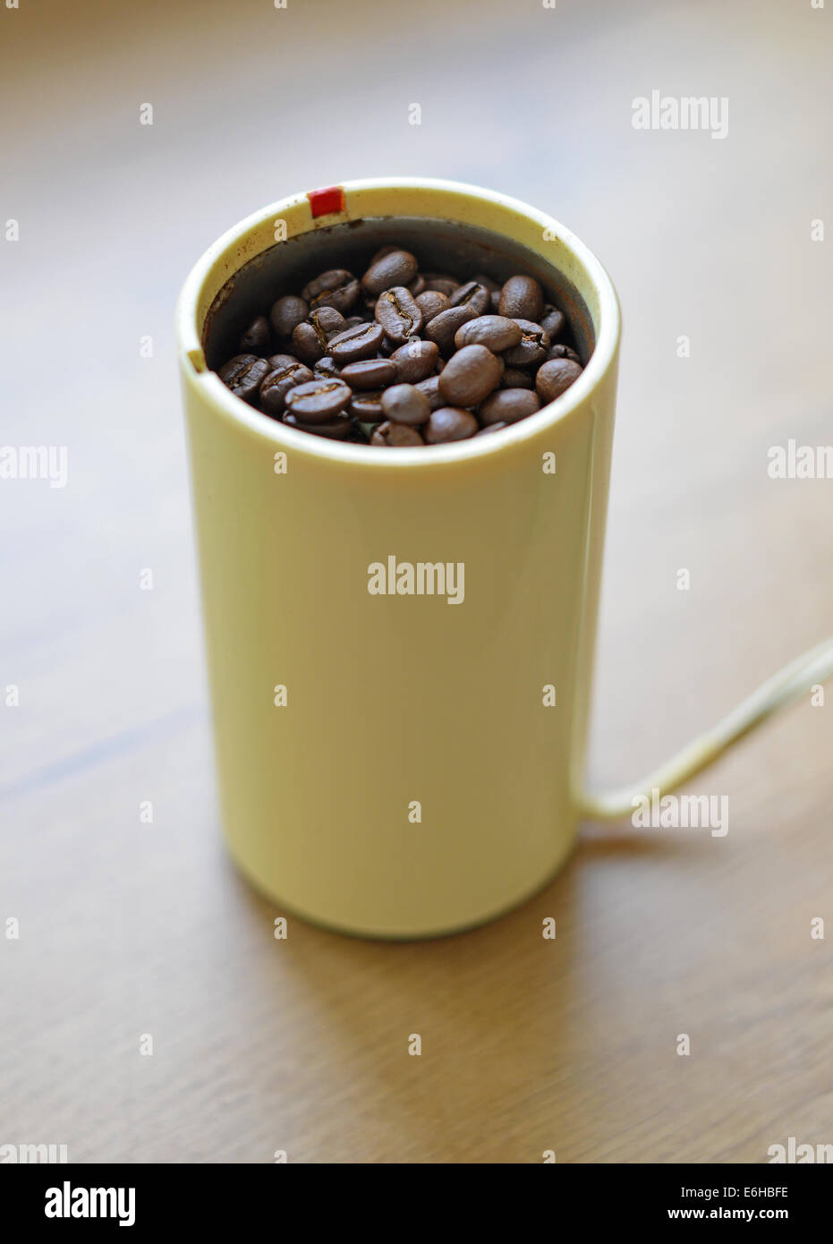 A blade or propeller coffee grinder on the table top Stock Photo - Alamy