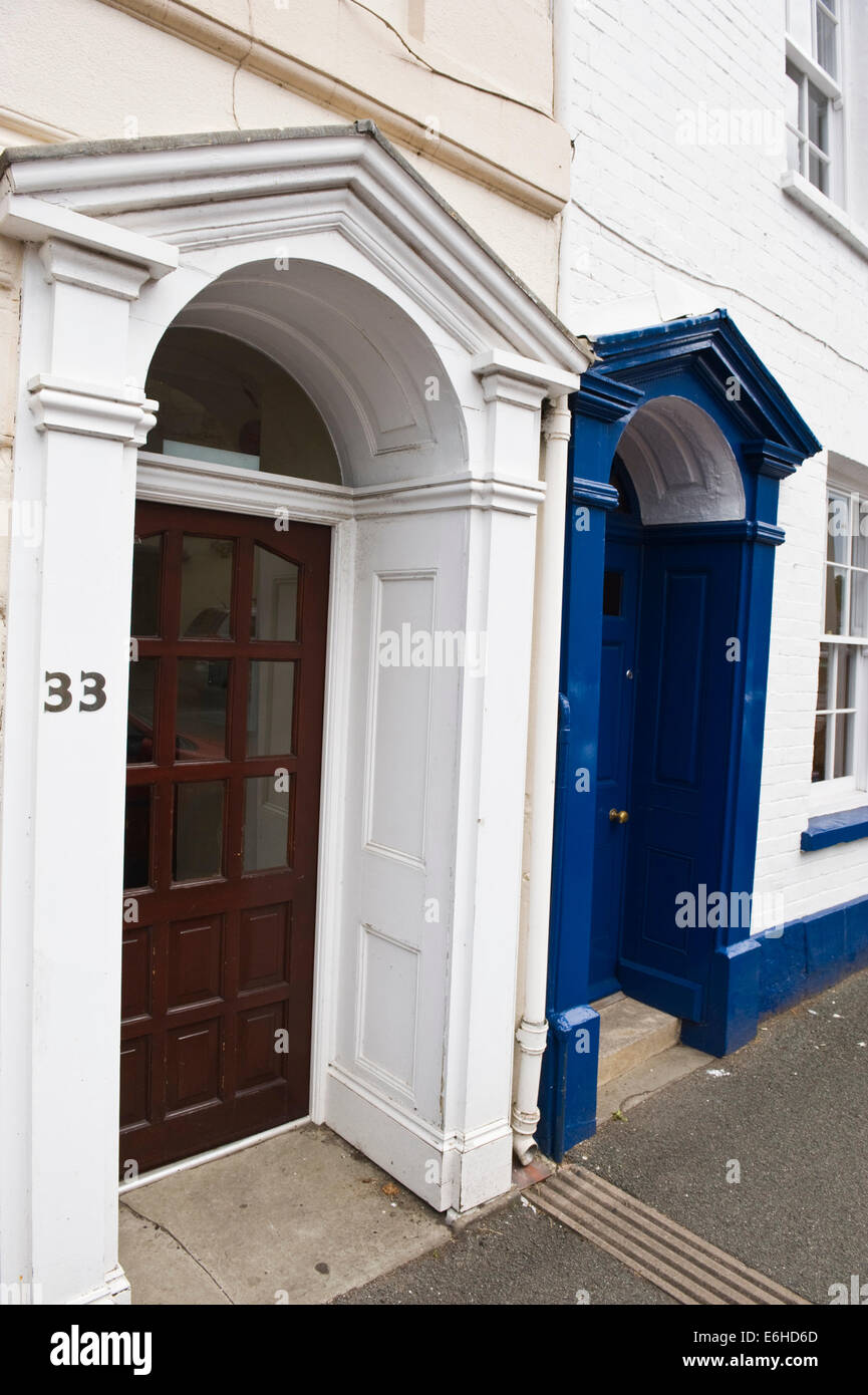 Brown number 33 & blue front doors of period houses in Brecon Powys ...