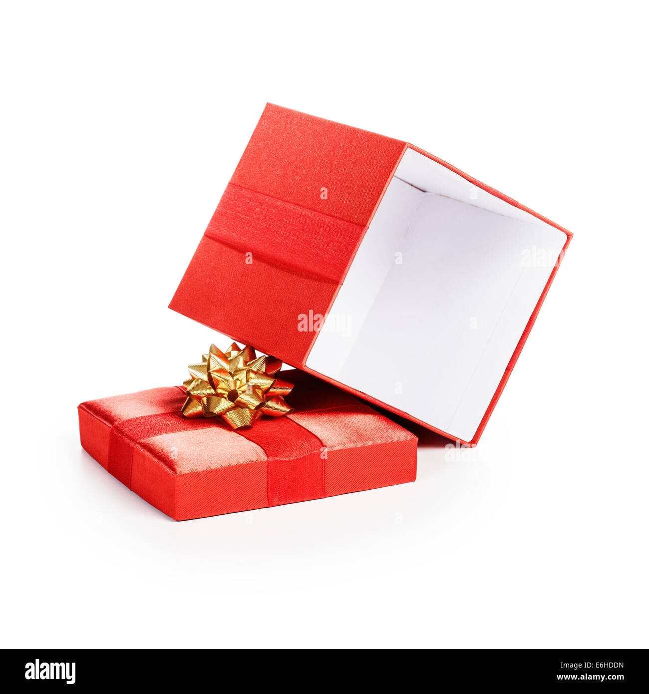Open red gift box with gold ribbon. Christmas theme. Object isolated on ...