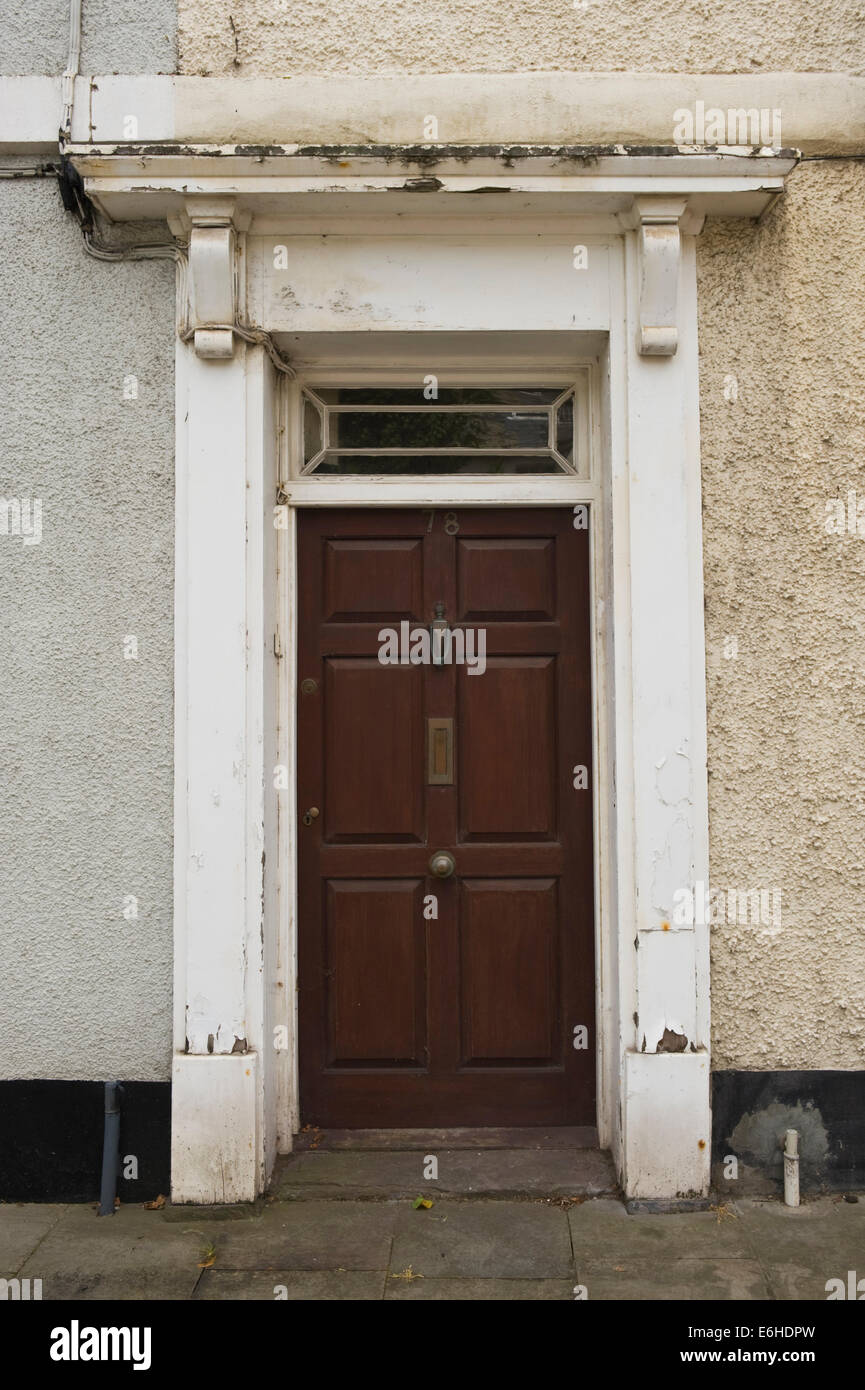 Brown number 78 wooden front door of period terraced house in Brecon ...