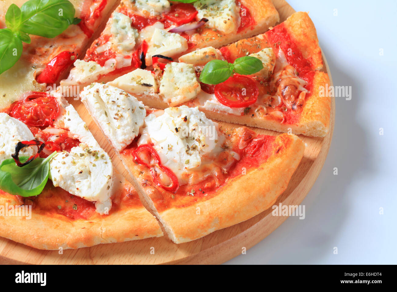 Slices of pizza quattro formaggi Stock Photo - Alamy