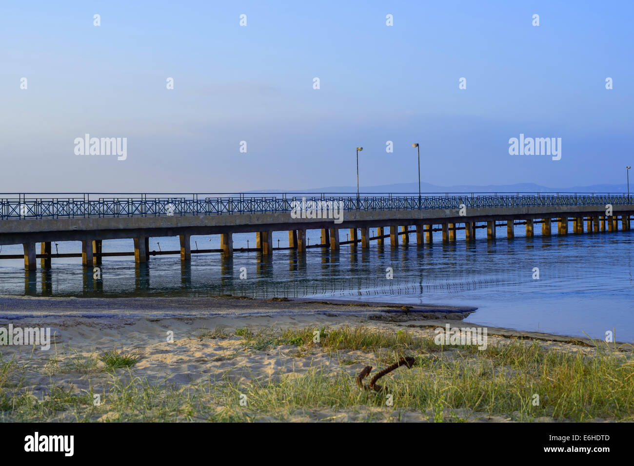 Pier in sunset Stock Photo - Alamy