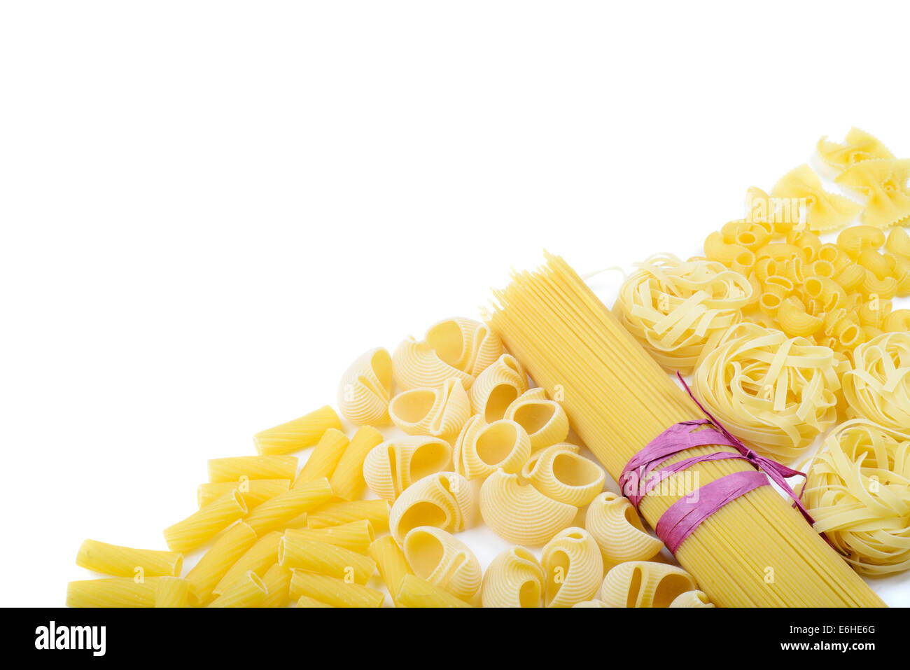 Mixed uncooked raw italian pasta with spaghetti Stock Photo - Alamy