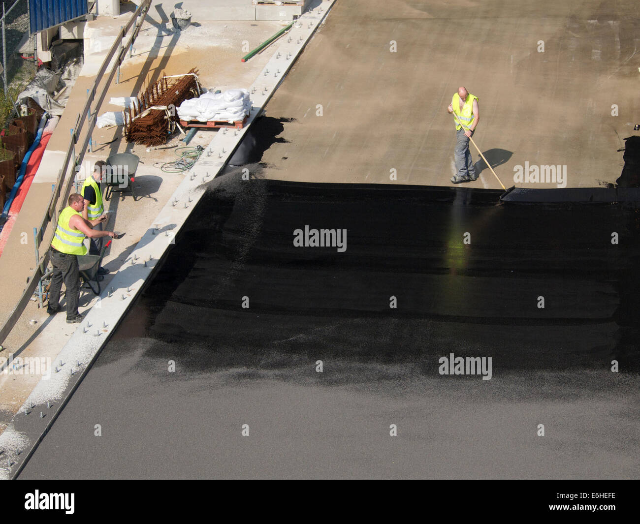 Men working on the road hi-res stock photography and images - Alamy
