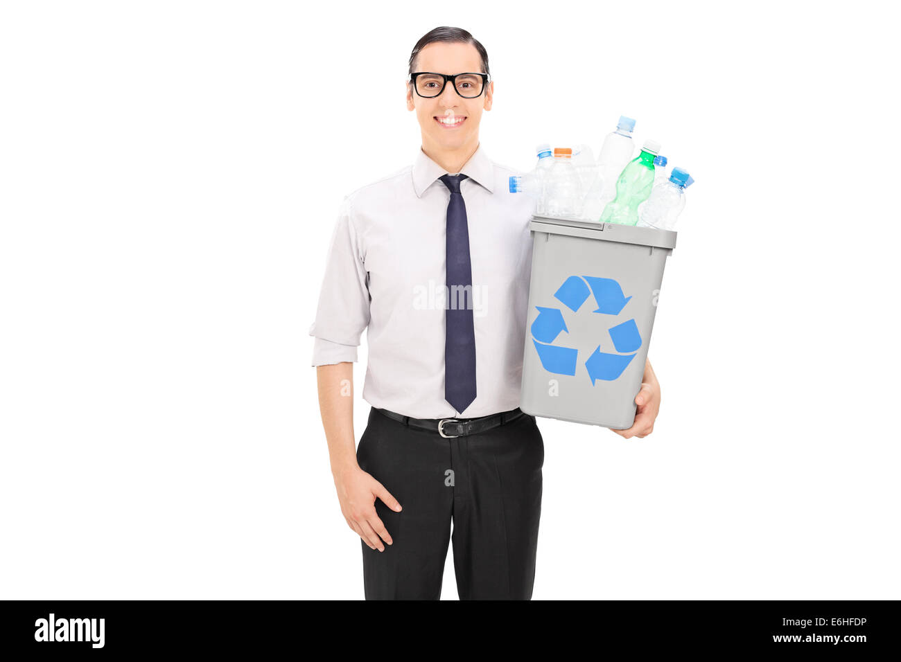 Man holding a recycle bin full of plastic bottles Stock Photo - Alamy