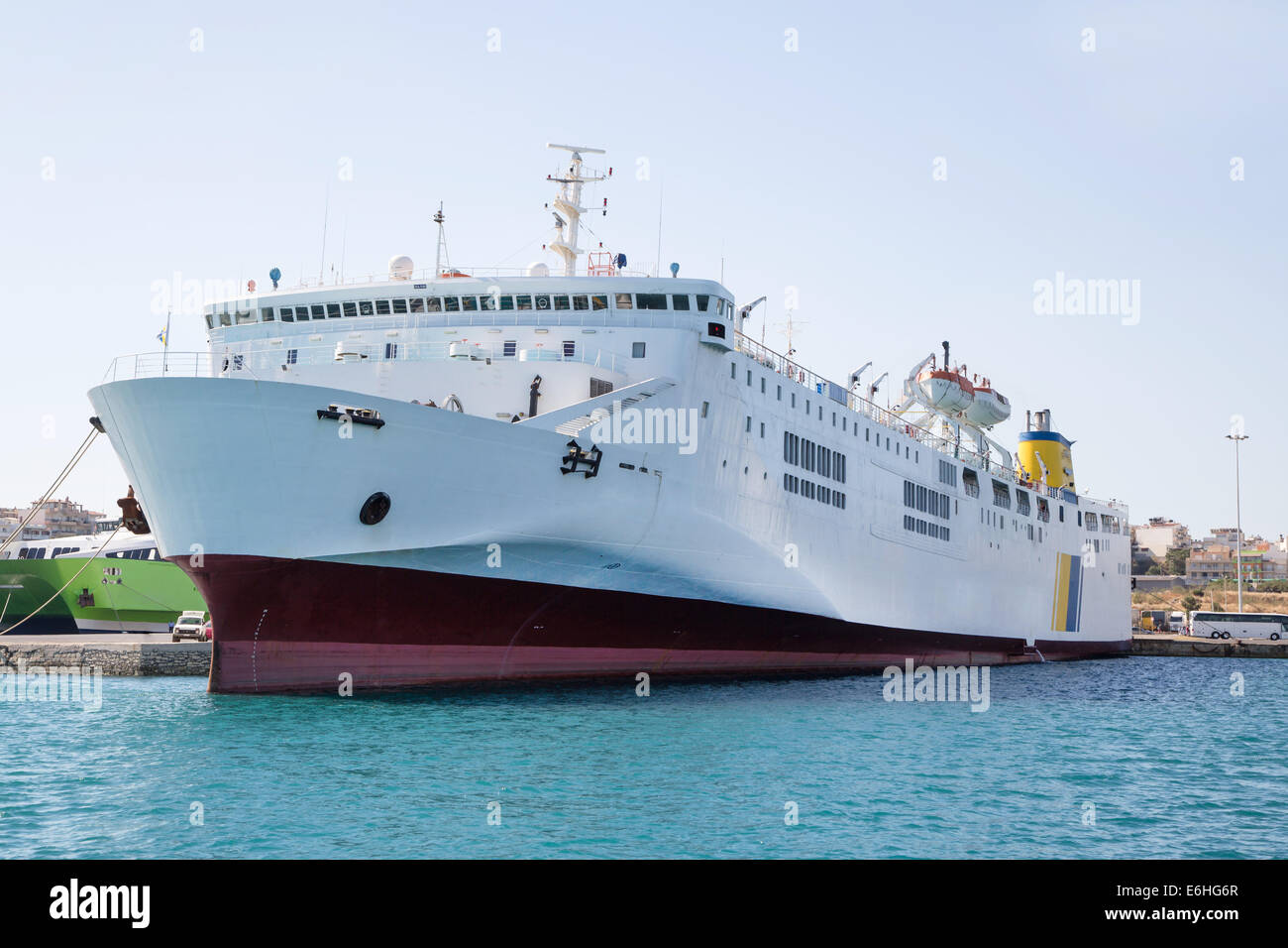Big and large ferry boat or cargo ship in the port with blue sky Stock ...