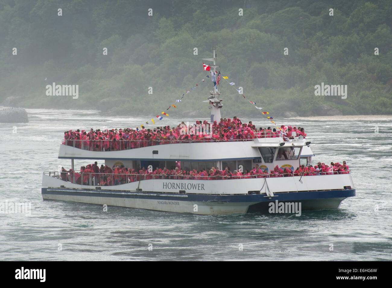 New York, Niagara. Crowded scenic tour boat (Hornblower), from the ...