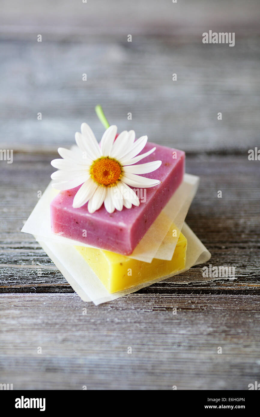 handmade herbal soaps and daisy Stock Photo - Alamy
