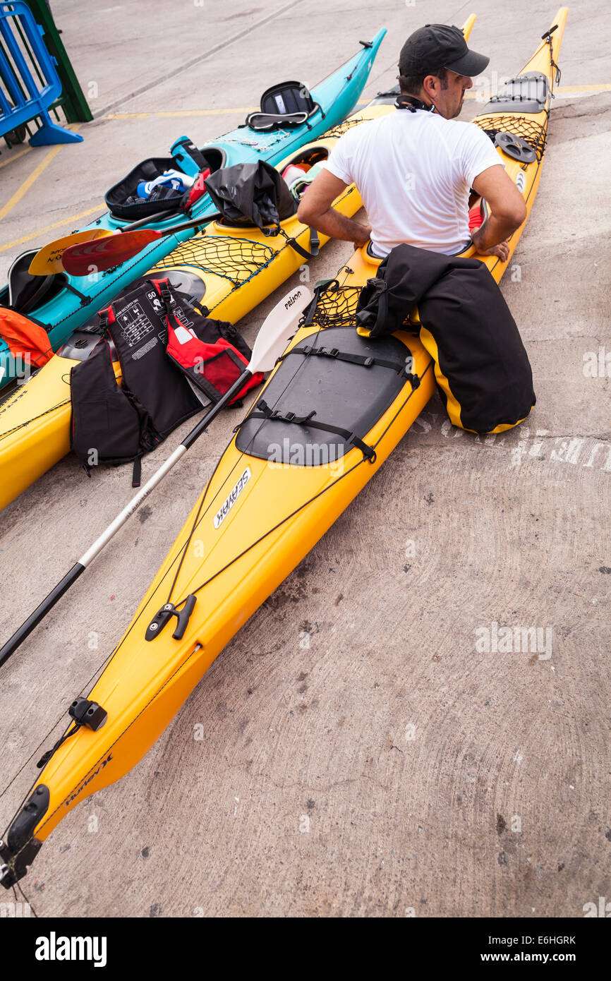 Participants preparing their canoes for a kayak race from Playa San ...