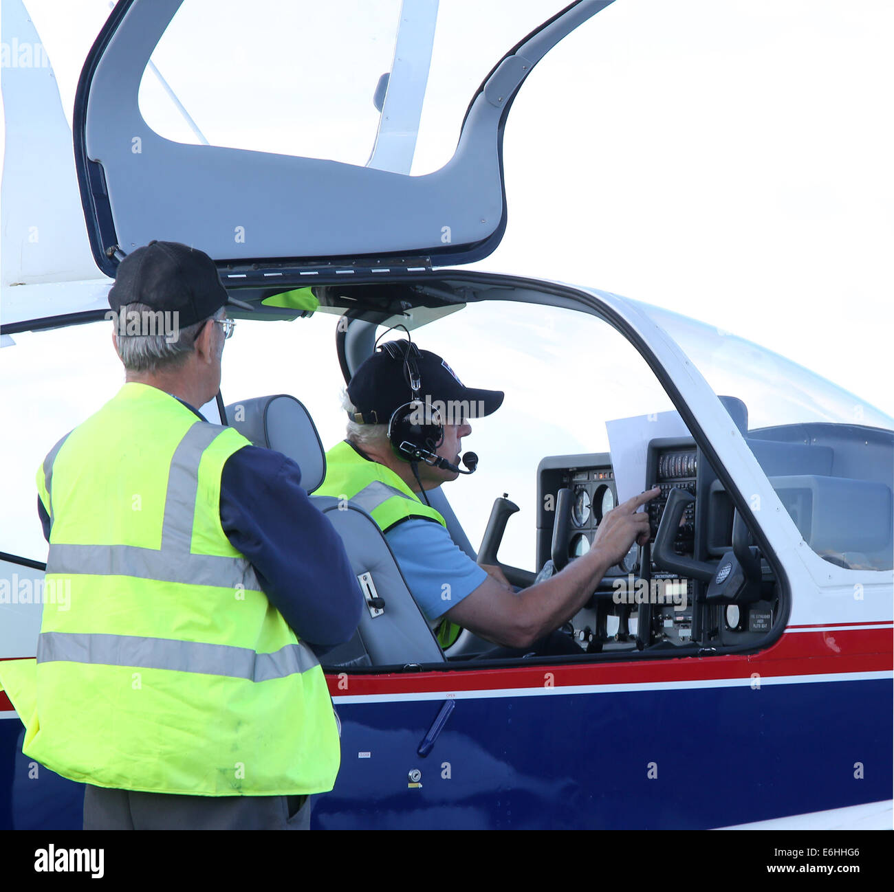 G-MRTN, a 1980 Socata TB-10 Tobago. Preflight checks giving passenger ...