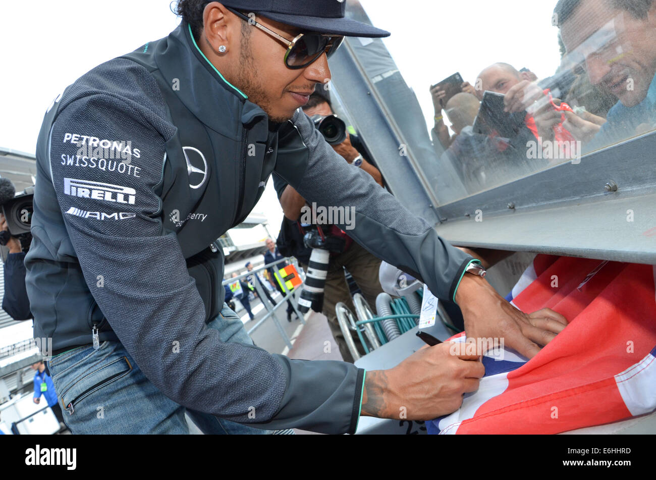 Lewis Hamilton (GBR), Mercedes AMG F1 team driver, signs autographs for ...
